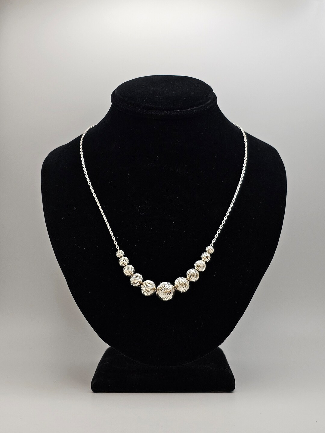 Diamond Cut Floating Bead Necklace in 925 Silver, Graduated Bead ...