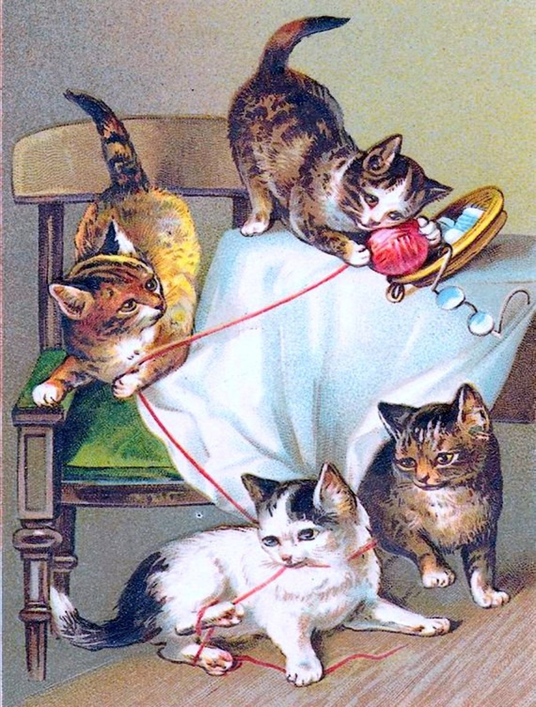 Kittens Playing With Yarn