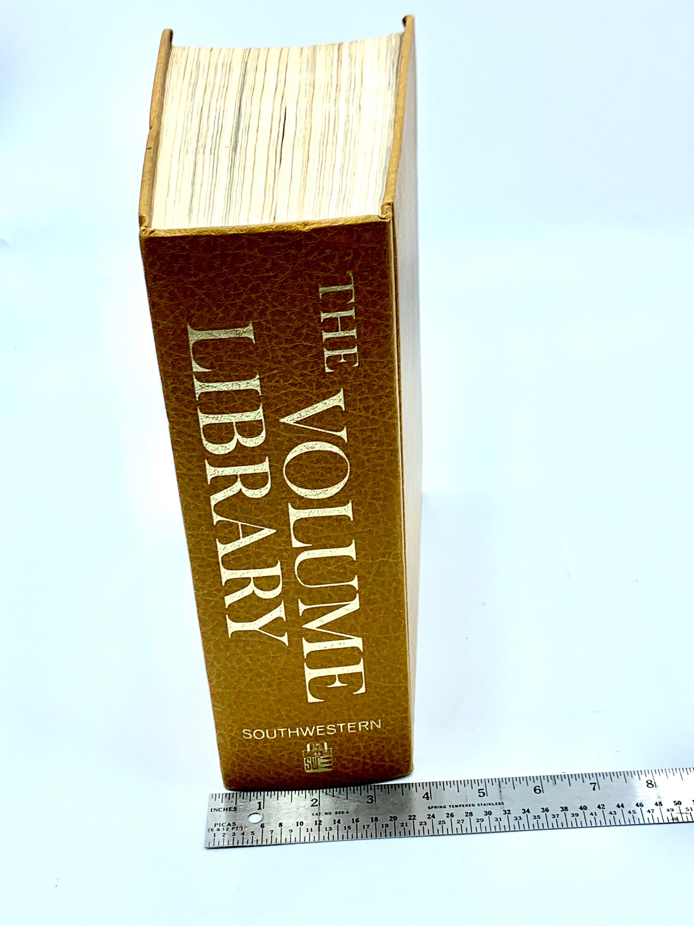 Vintage book, home encyclopedia called The Volume Library with amber ...