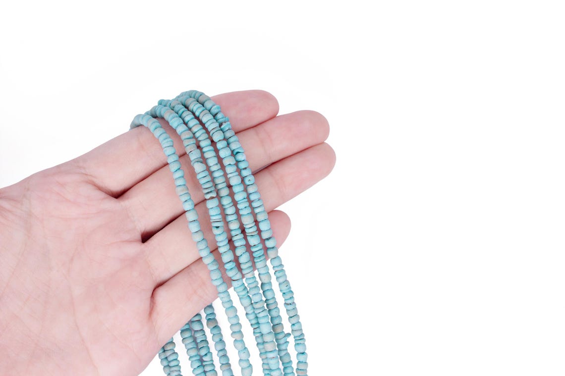 2-3mm Baby Blue Coconut Shell Pucalet Rondelle Beads - Dyed and Waxed ...