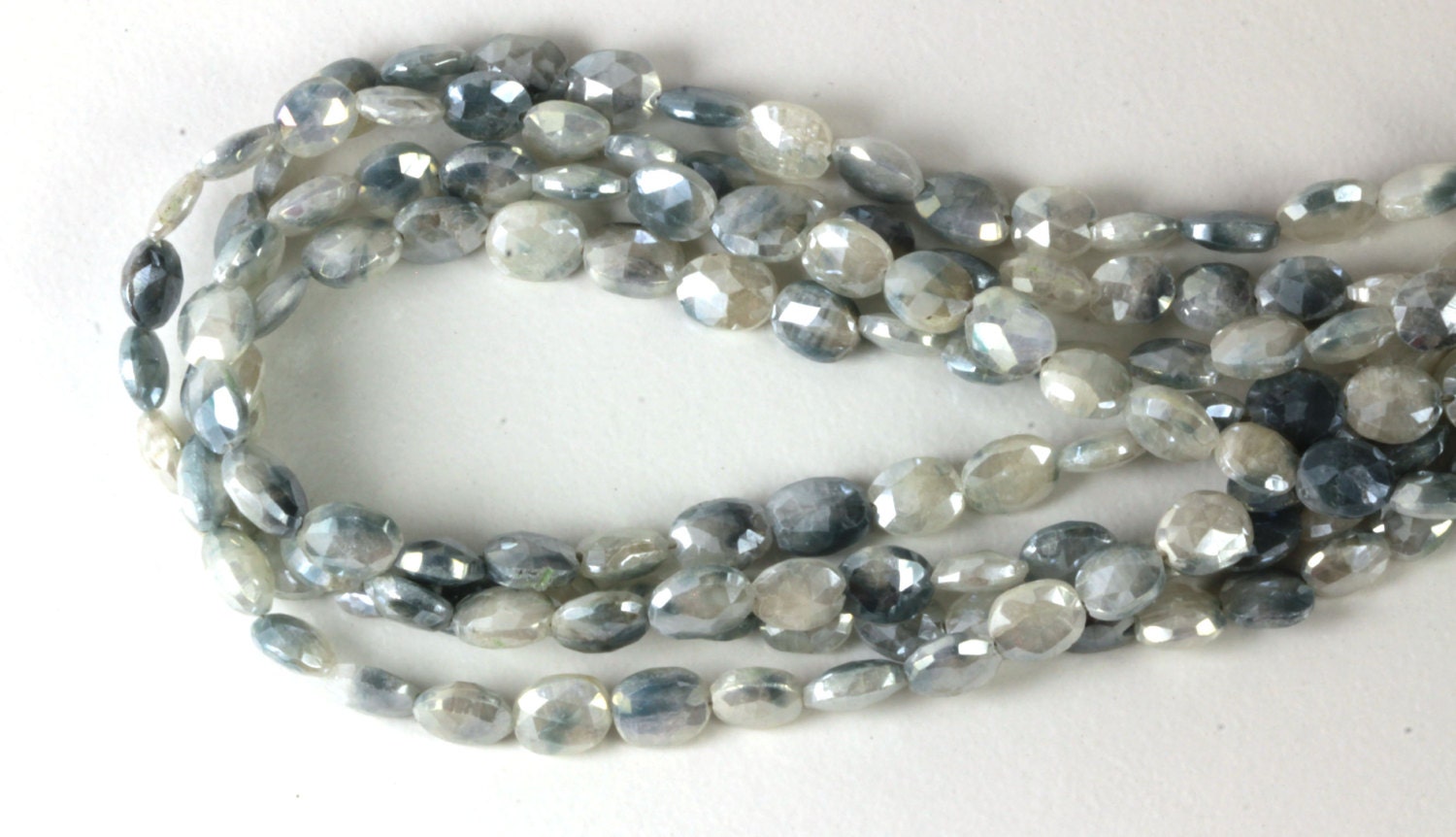 Silverite Faceted Oval Briolettes Gemstones AB Coated, 5mm X 7mm, Blue ...