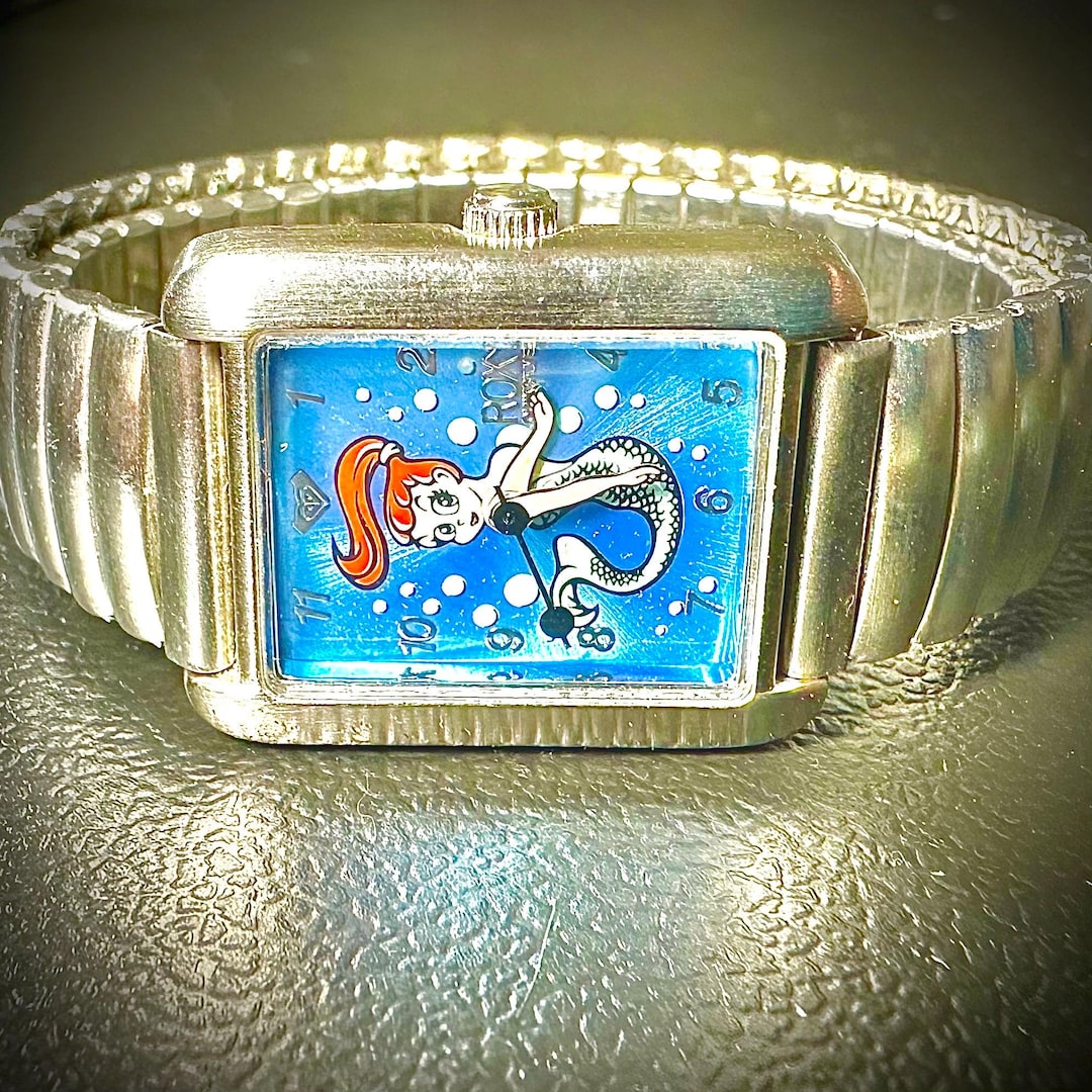 50% Off! Vintage Roxy Quicksilver Mermaid Blue Face Stainless Steel ...