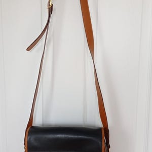 Venice Simplon Orient Express Black Leather & Tan Handbag. Crafted in ...