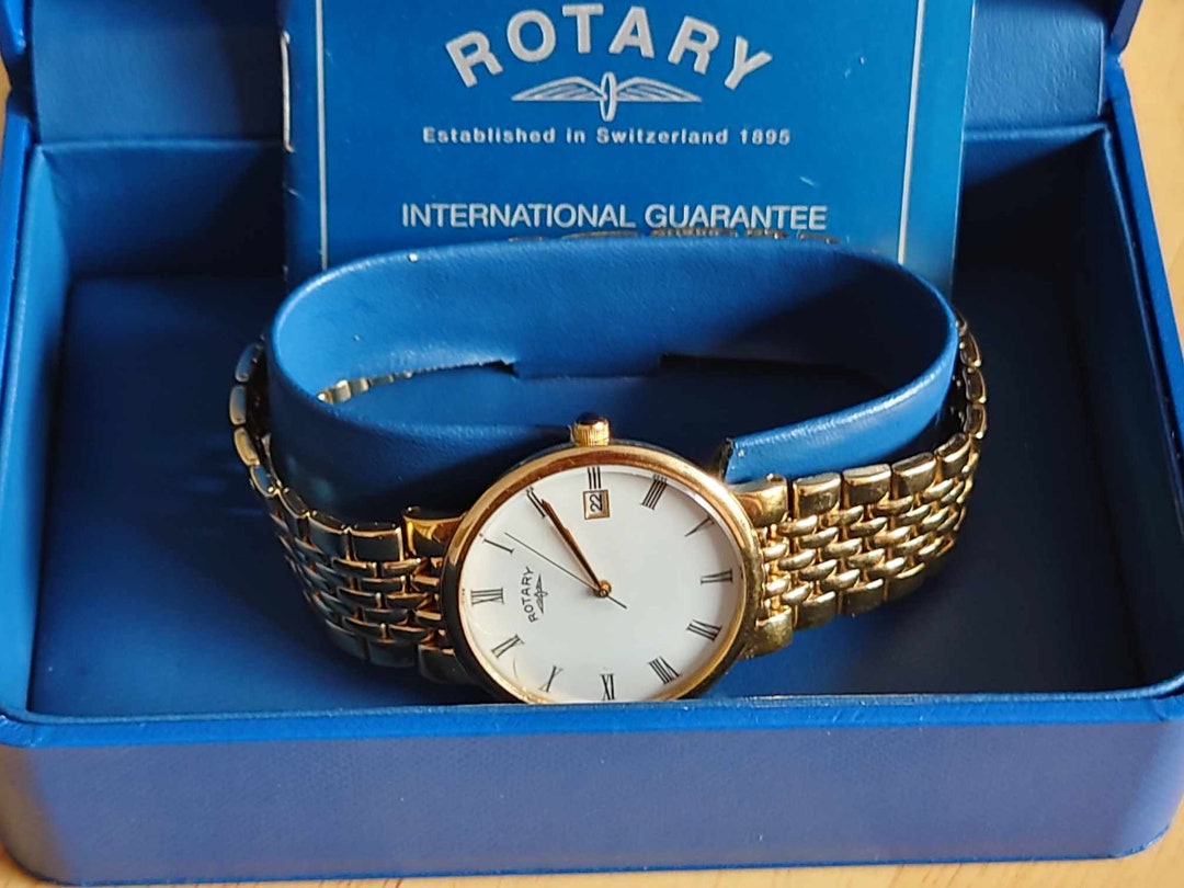 ROTARY Gents Watch White Dial With Date Window Gold Tone Strap ...