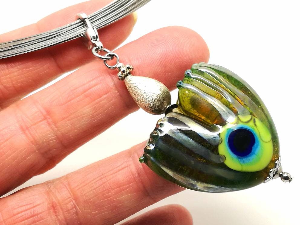 Colgante de pavo real en Reif - Etsy España