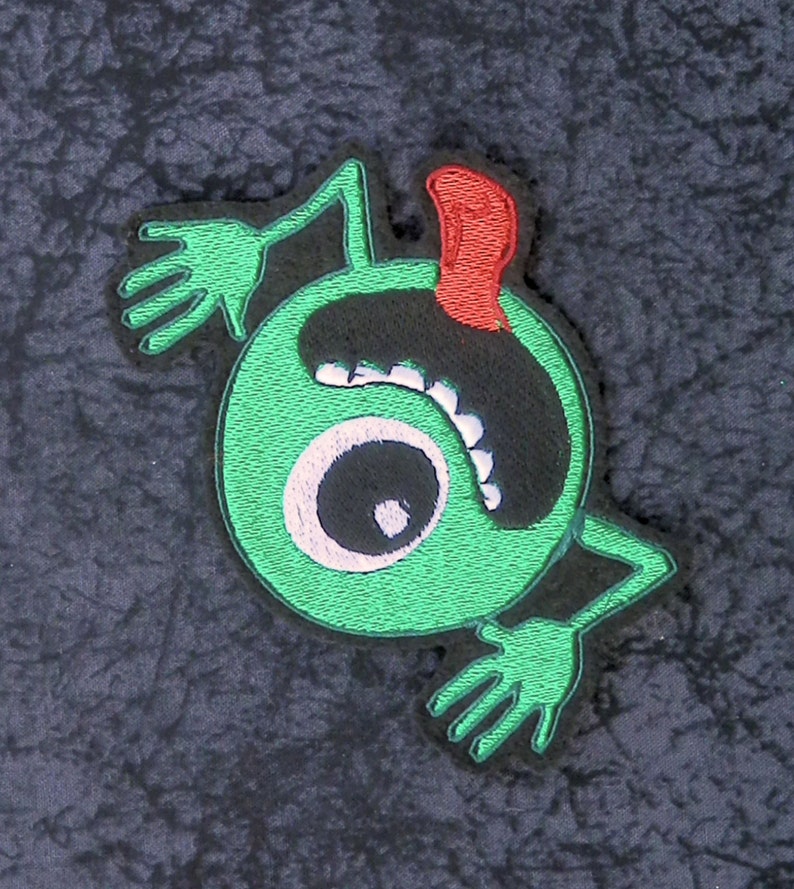 One Eyed Monster Iron on Patch Evil Eye Hitchhikers Guide | Etsy