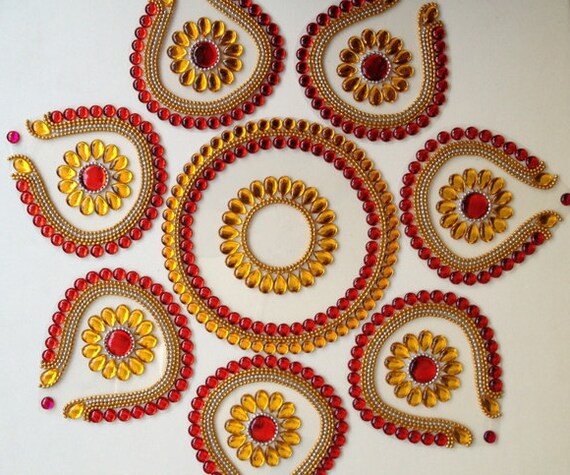 Items similar to 8 Pieces Beautiful Red and Golden Yellow Rangoli on Etsy