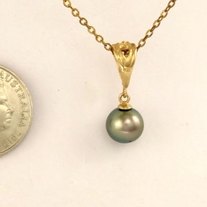 Tahitian Black Pearl Pendant With an Articulated, Lace Net Bail in ...