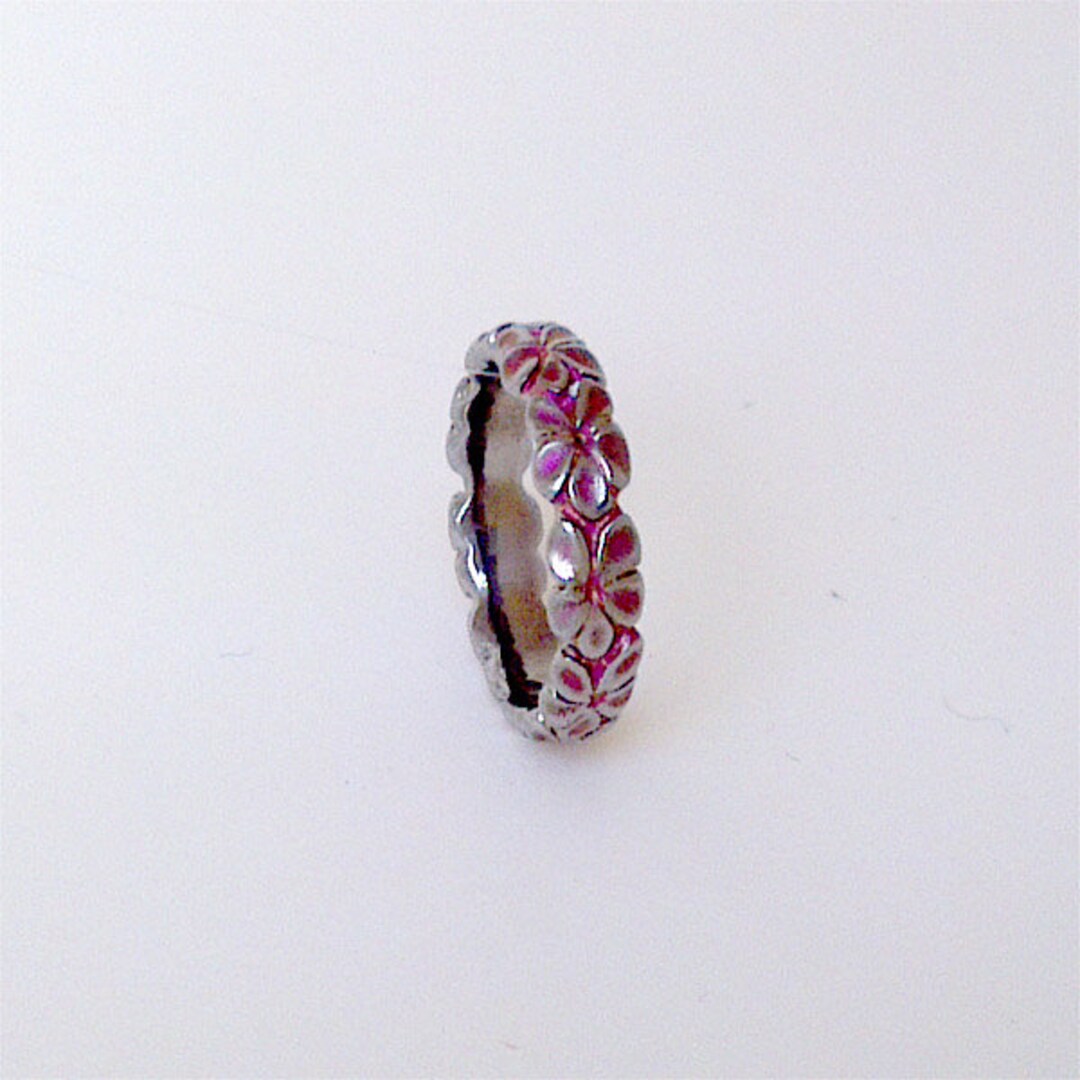 Titanium Flower Ring, an Intricately Carved Row of Flowers . in ...