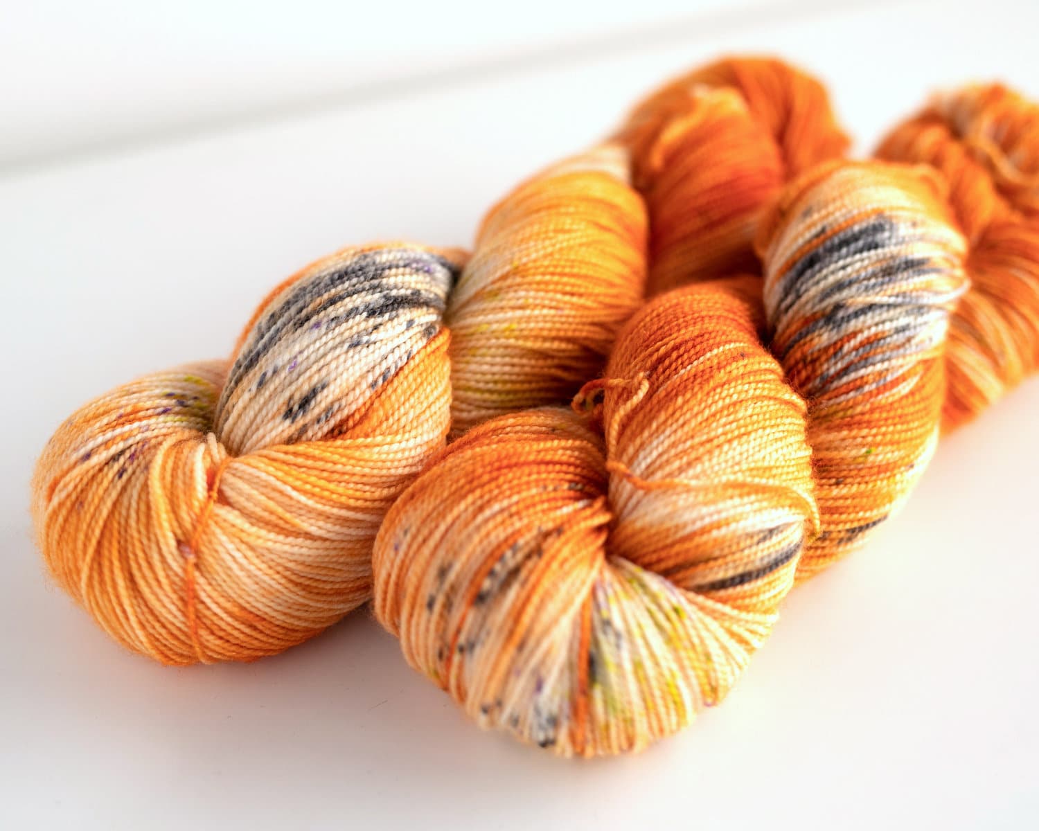 Hand Dyed Sparkle Yarn | Variegated Hand Dyed Yarn in Orange + Black ...