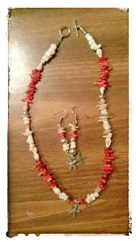 Items similar to red coralwith cream shells and silver tone star fish ...