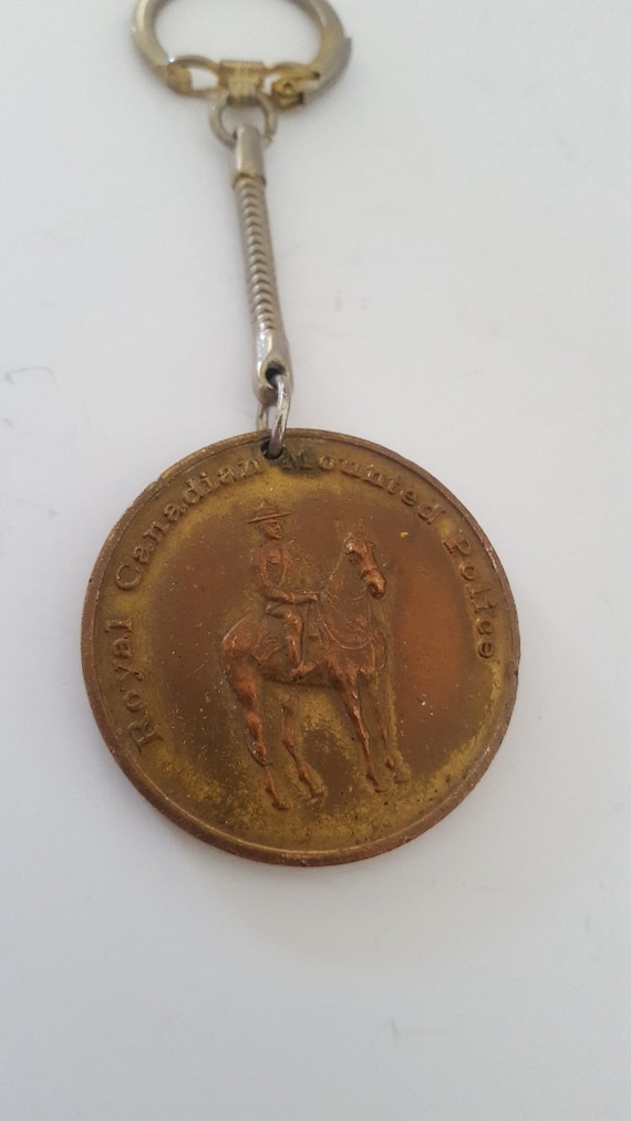Vintage Royal Canadian Mounted Police keychain medall… - Gem