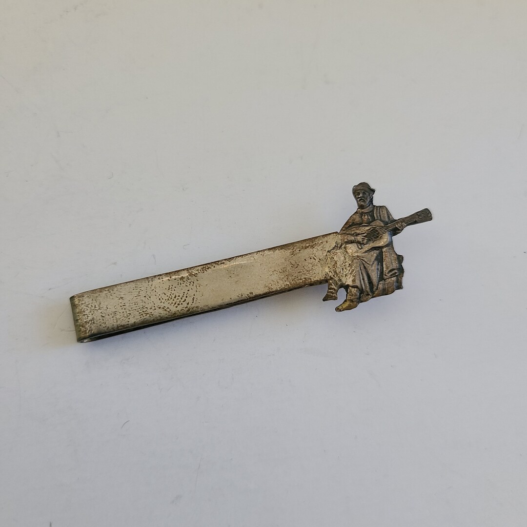 Vintage Circa 1950's Tie Bar Features a Musician Sitting With a Guitar ...