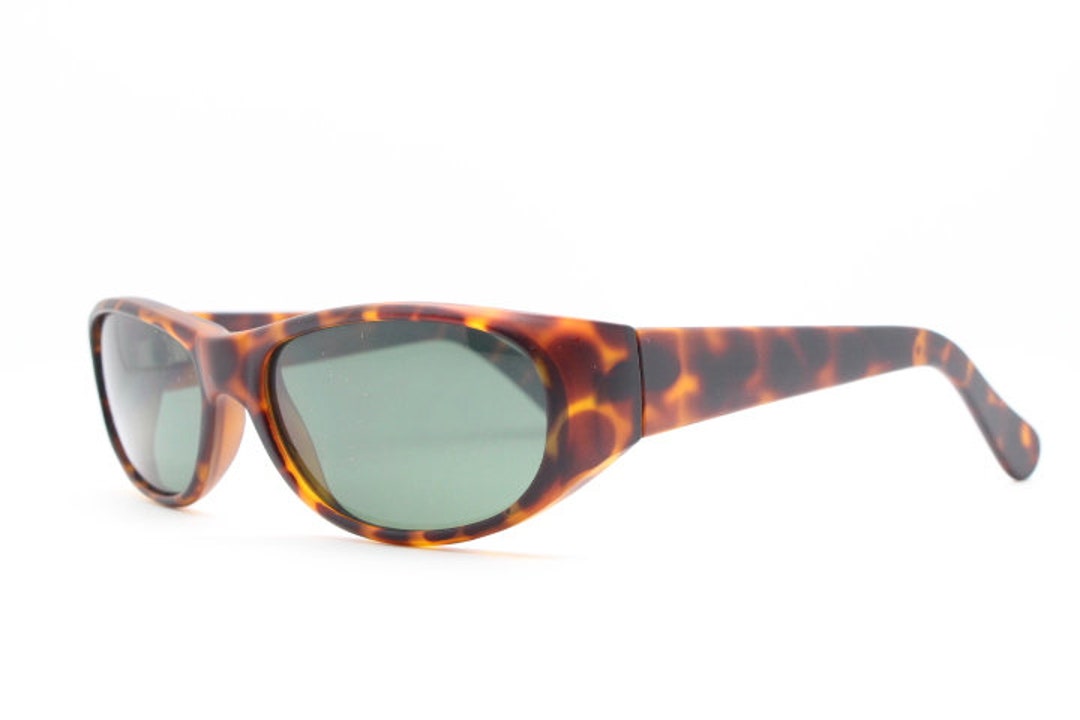 Gafas de sol vintage de los años 90. Montura envolvente estilo años 60 ...