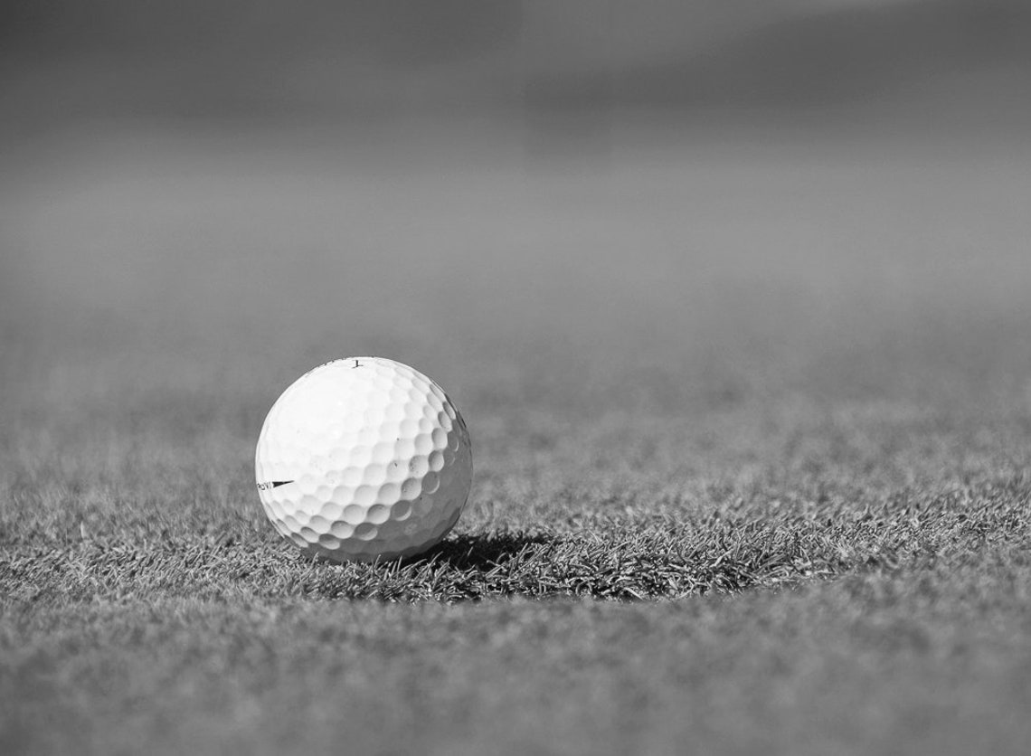 Black & White Golf Photo: Picture of A Golf Ball on the Green Near the ...