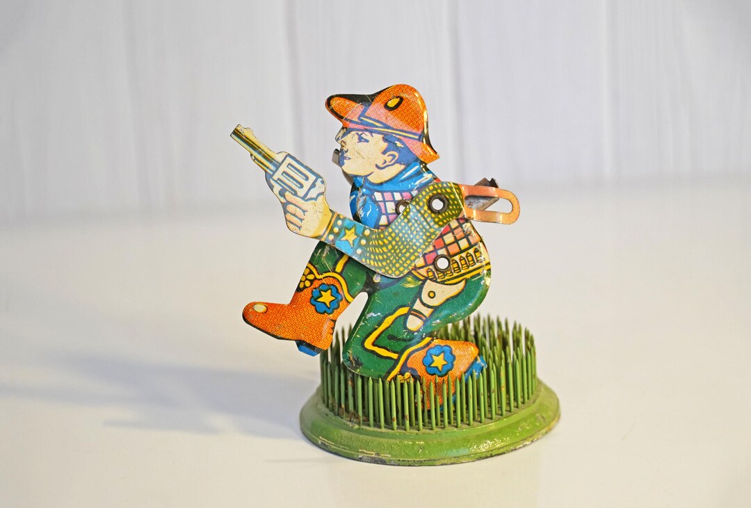 Vintage 1940s - 1950s Tin Litho Mechanical Cowboy Gun Slinger, Clicker ...