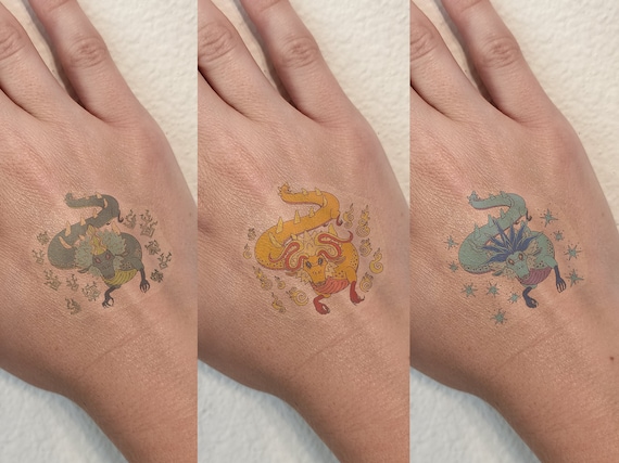 Tribal Mercury Symbol Tattoo