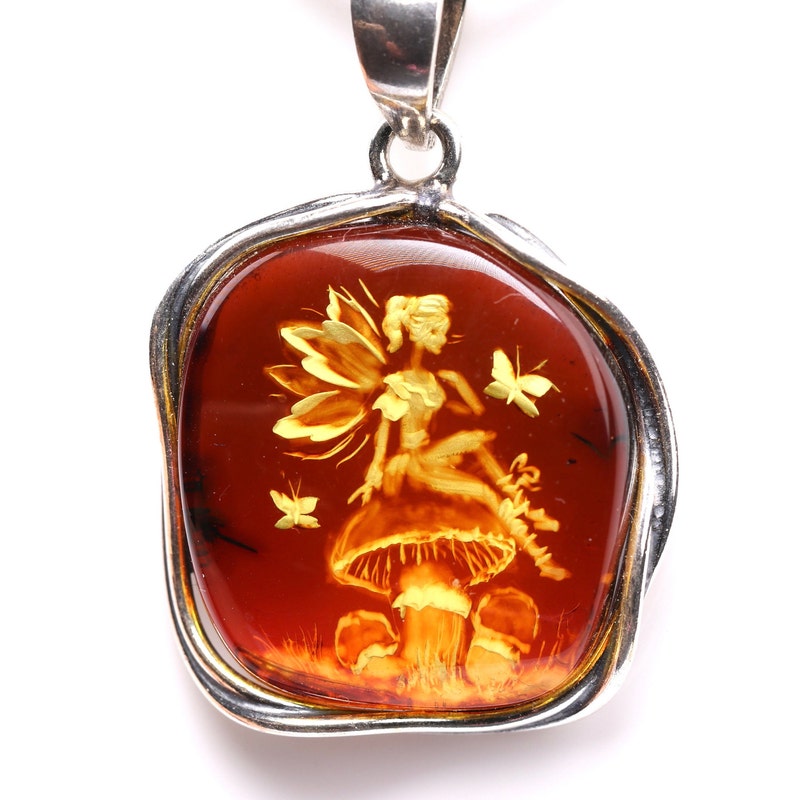 Carved Amber - Etsy