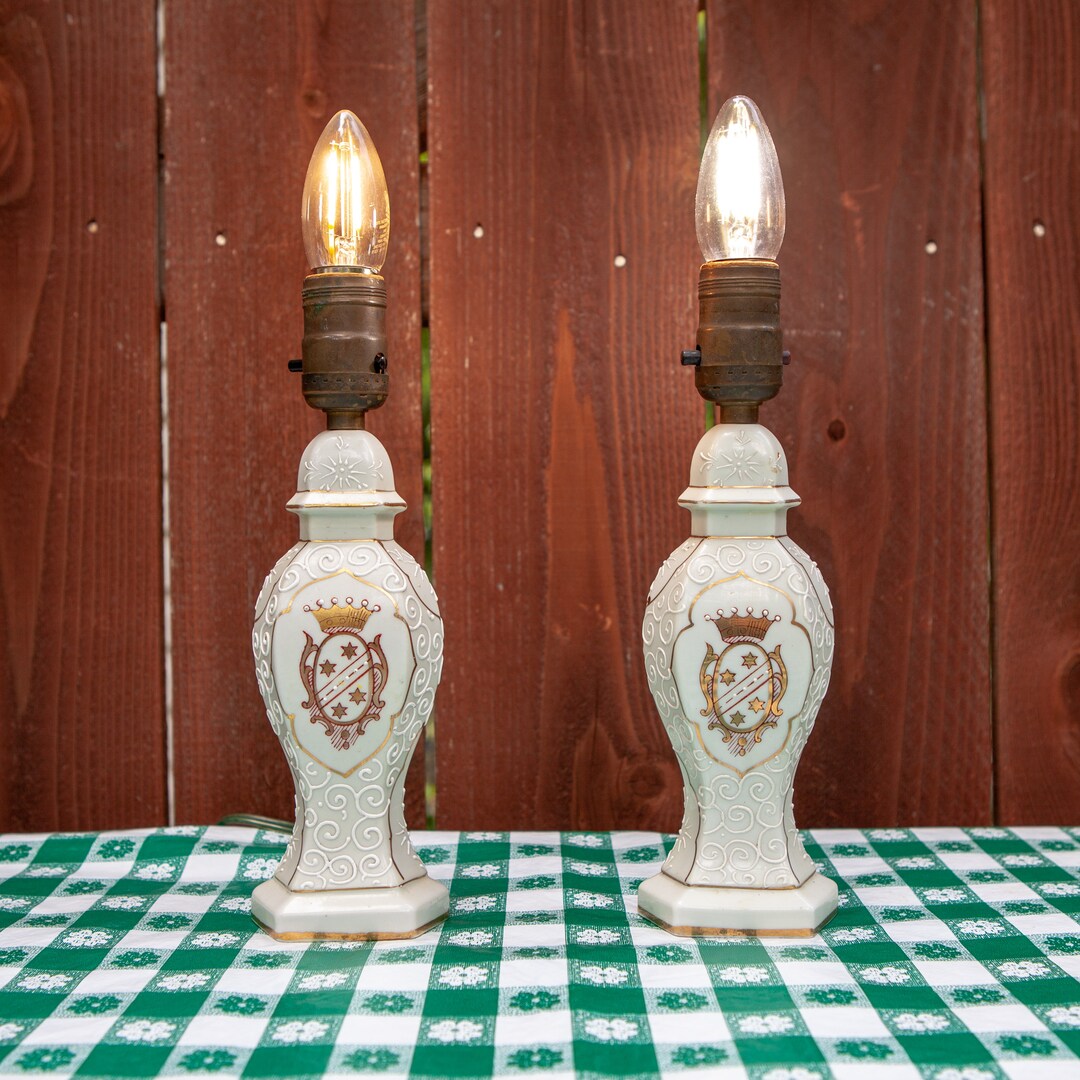 Two Matching 8-inch High Porcelain Lamps With Crown Crest Illustration ...