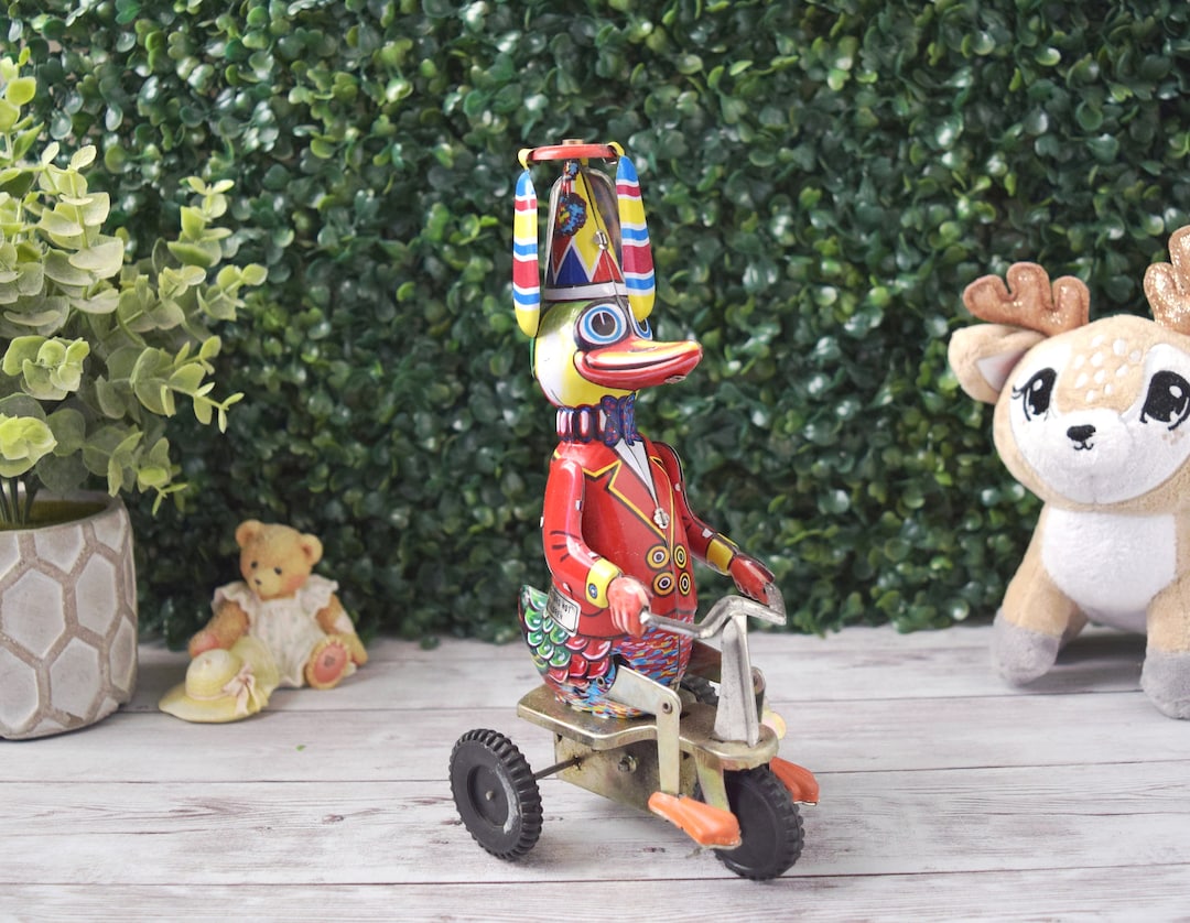 Vintage Schylling Duck on Bike Wind up Mechanical Tin Litho Circus Duck ...