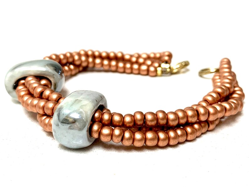 Metal copper and grey shellacked clay beaded multi-strand | Etsy
