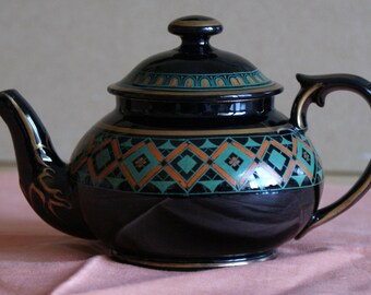 Terracotta teapot | Etsy