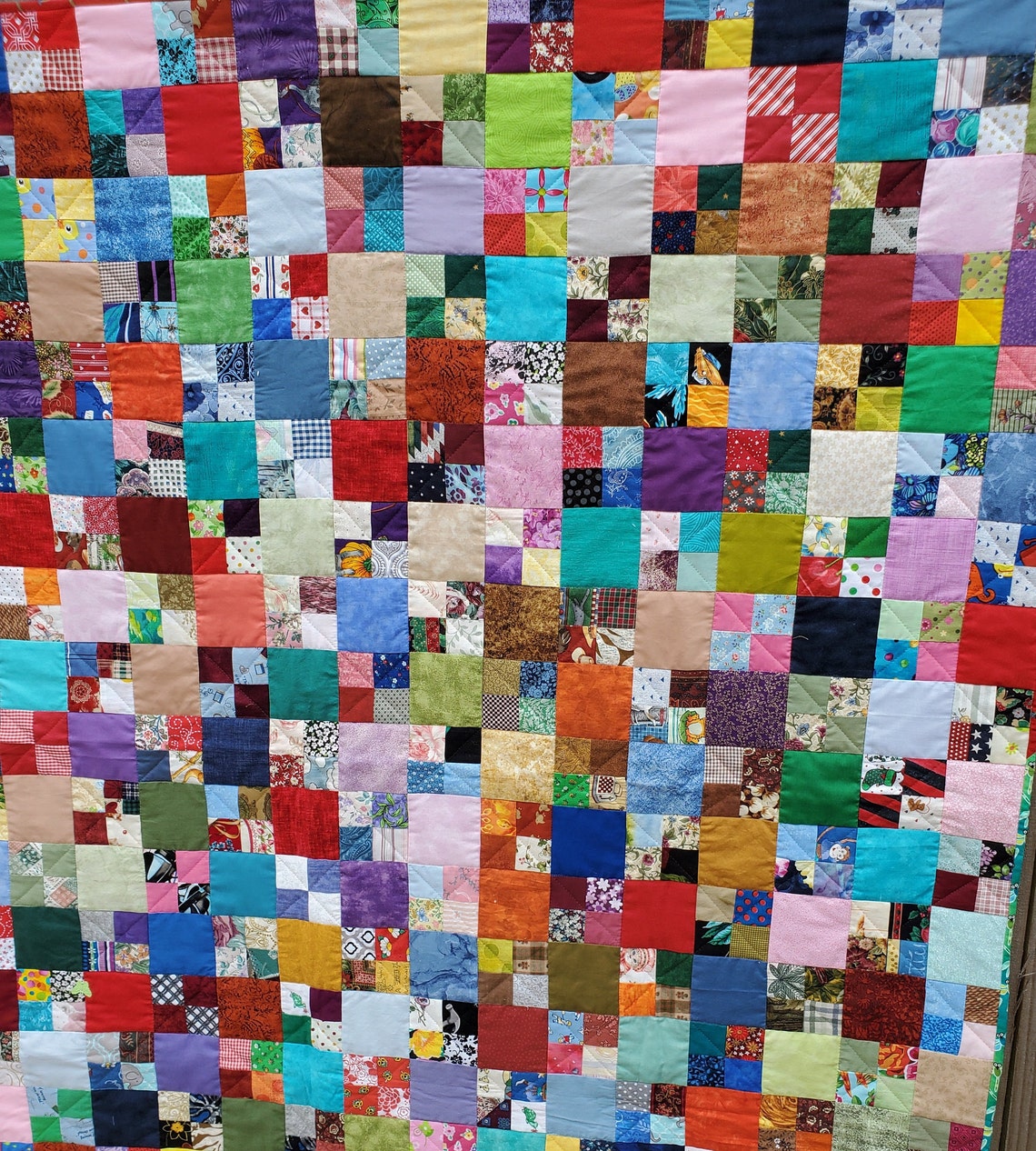 Scrappy Four Patch Blocks Alternating With Square Blocks Quilt ...