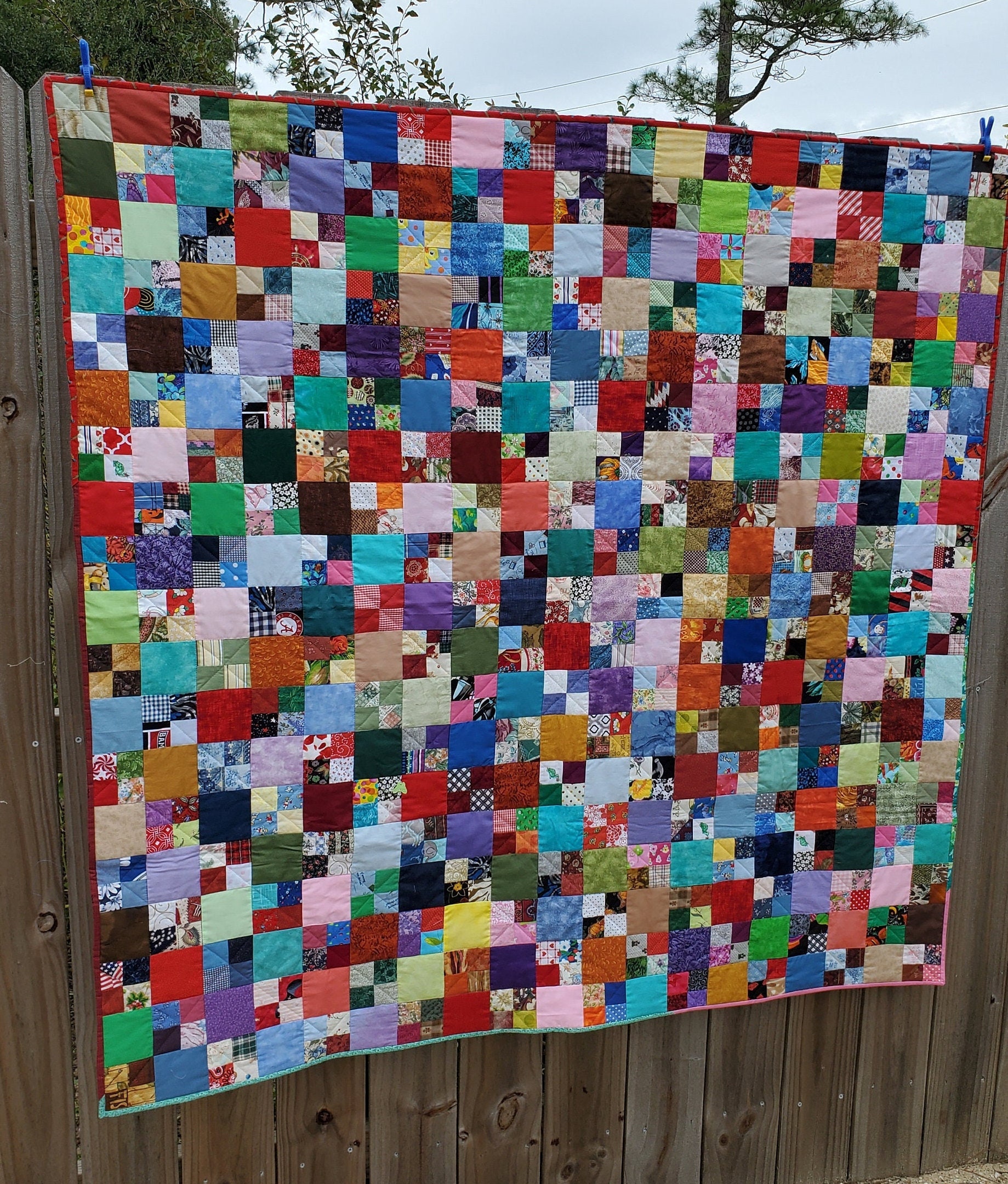 Scrappy Four Patch Blocks Alternating With Square Blocks Quilt ...