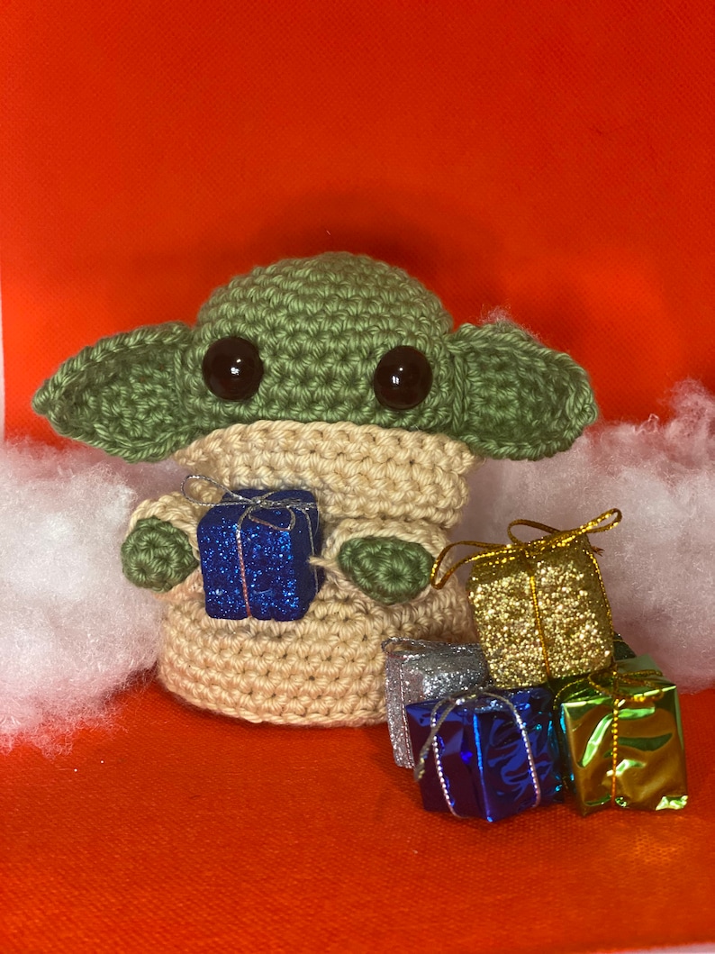 Baby alien holding gift made to order | Etsy