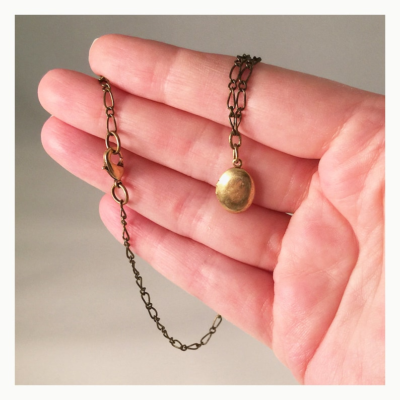 Tiny locket vintage brass keepsake necklace. Dainty photo | Etsy