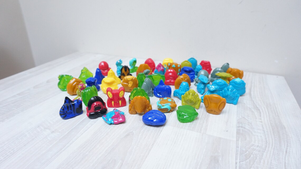 10 zufällig ausgewählte Dracco Heads Crazy Bones Gogos Sammlung ...