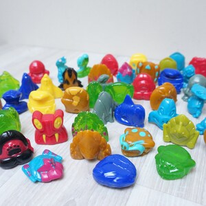 10 zufällig ausgewählte Dracco Heads Crazy Bones Gogos Sammlung ...