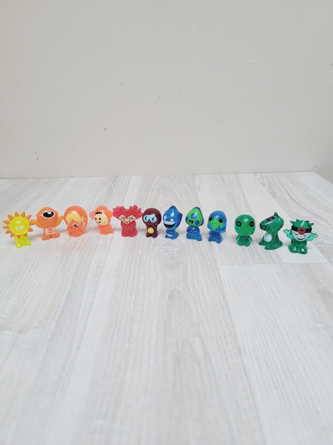 Bundle of 12 Seethru Glitter Crazy Bones Gogos, Multi Color Collection ...