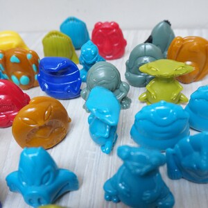 10 zufällig ausgewählte Dracco Heads Crazy Bones Gogos Sammlung ...