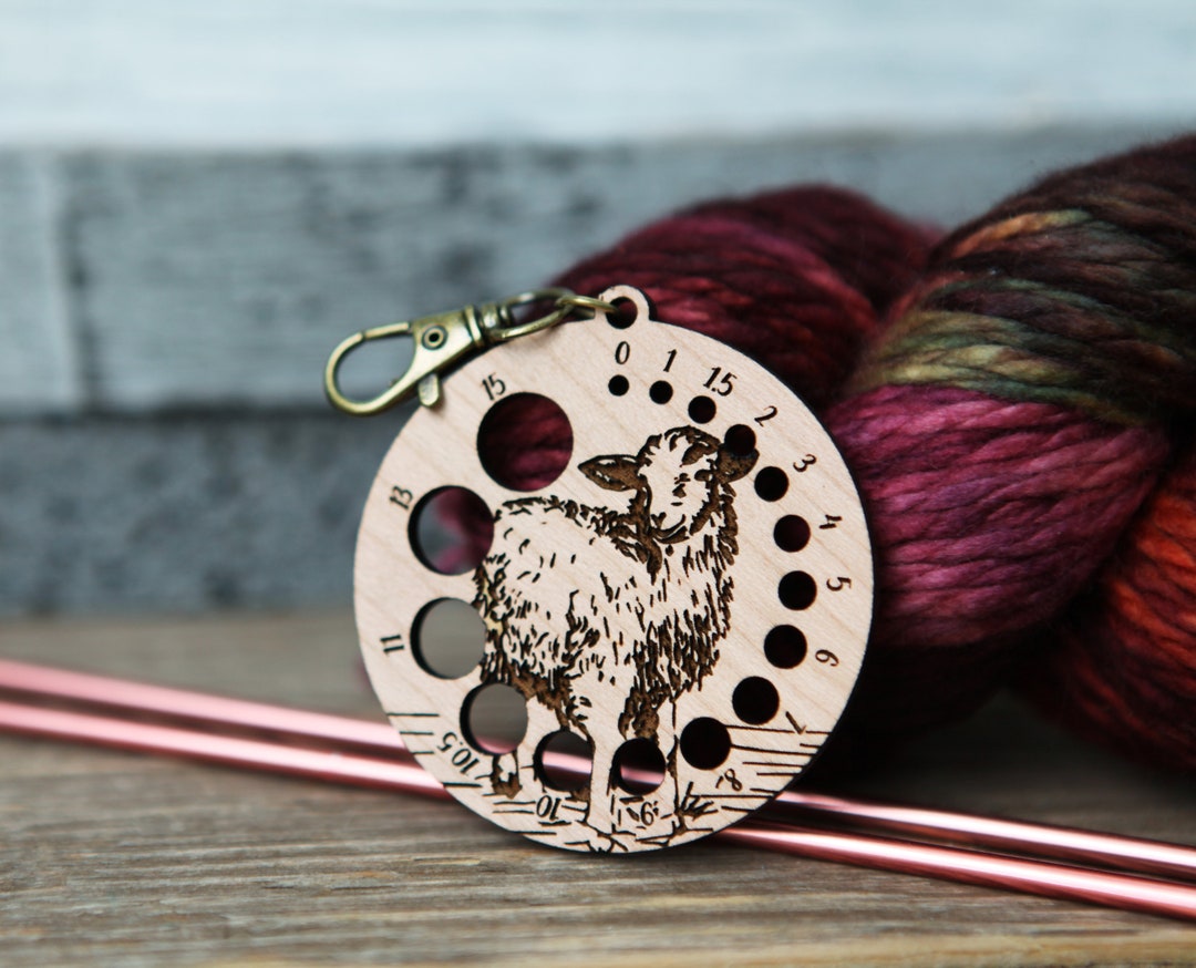 Knitting Needle Gauge Guide With a Sheep Standing on a Grassy Hill ...