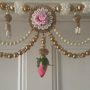 Surabhi Toran Thiran Detailed With Lakshmi Ji’s Favourite Cowrie Kaudi ...