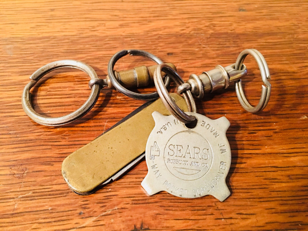 Two Neat Little Keychains One Craftsman/sears One Brass With a Pocket ...