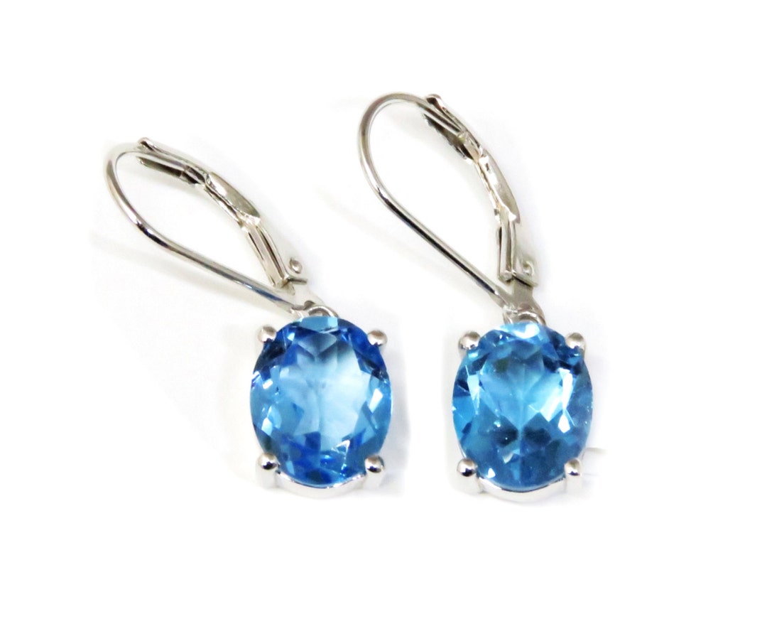 E10810LS Classic Style Oval Shape Blue Topaz November Birthstone Prong ...