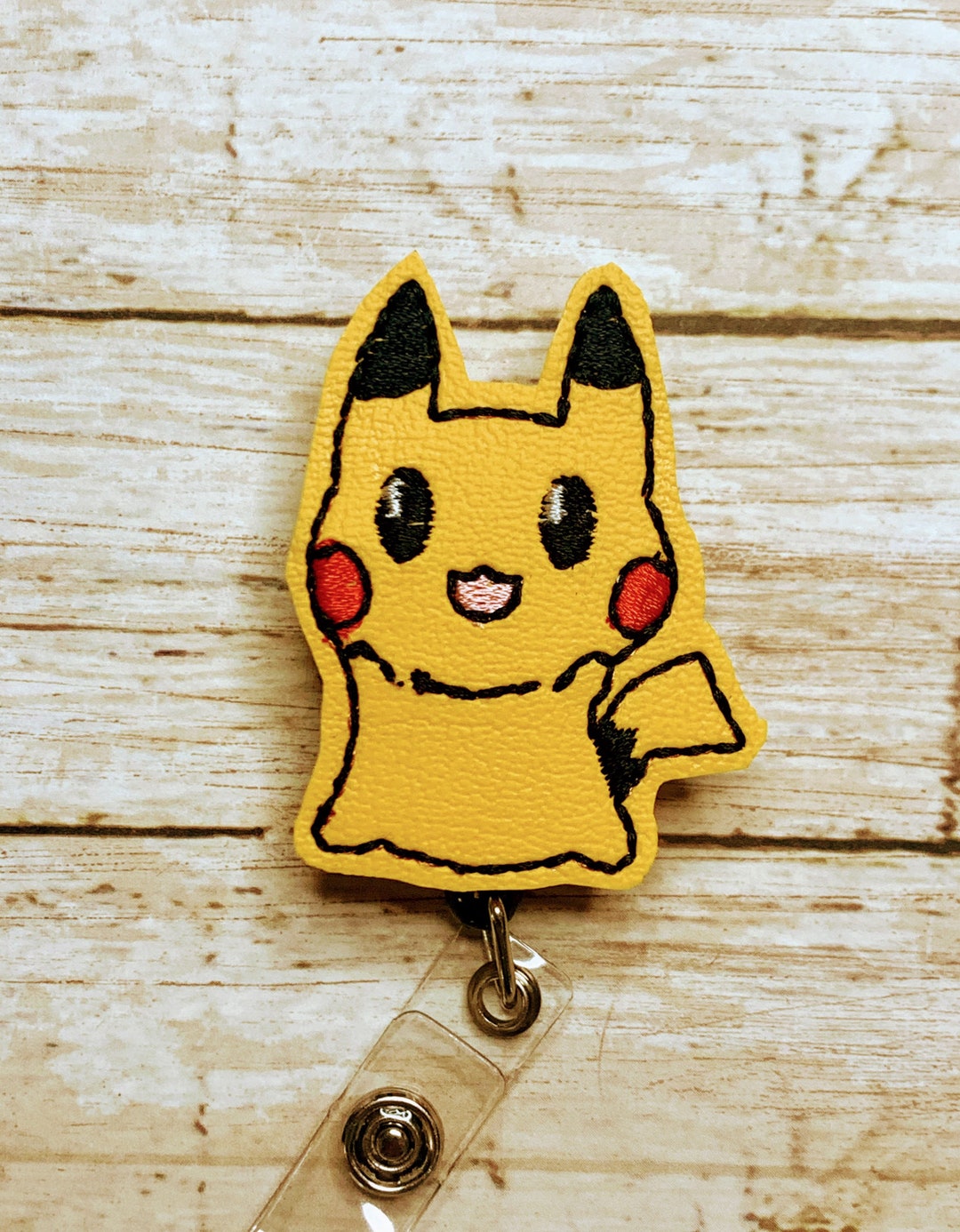 Matte Vinyl Poke Yellow Pika PREMIUM Badge Reel - Etsy