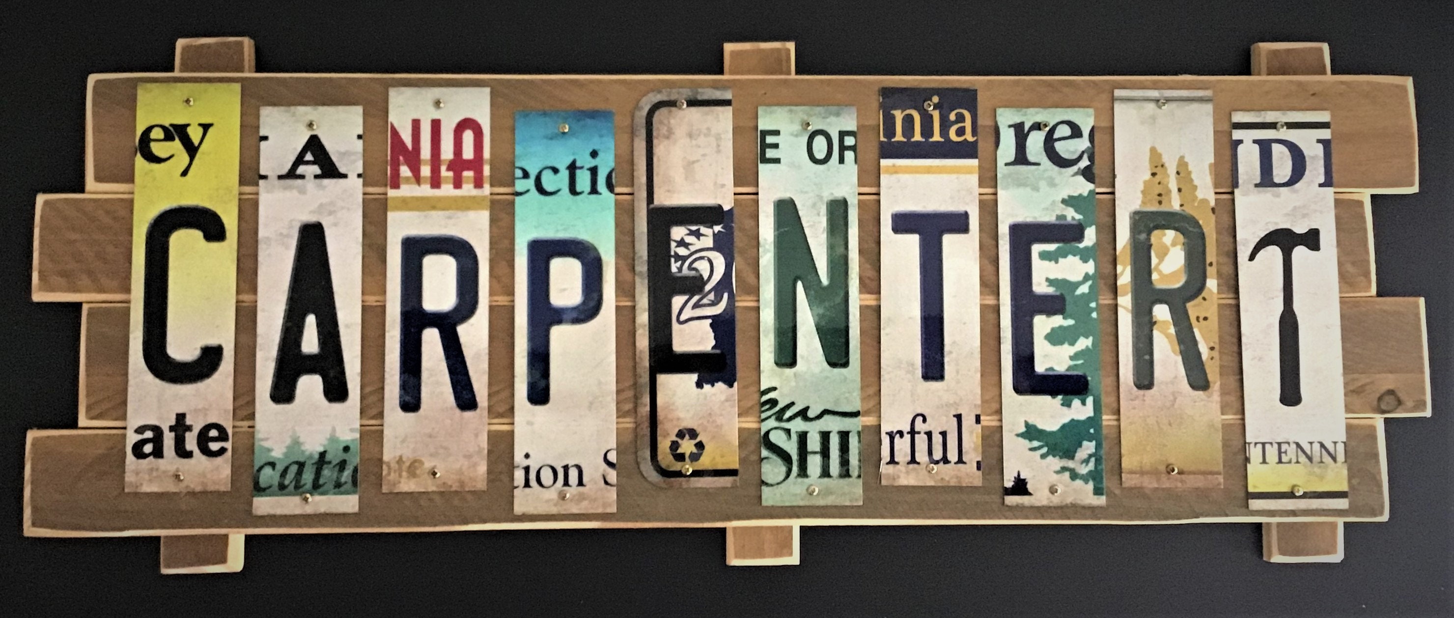 Carpenter Cut License Plate Strip sign
