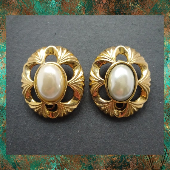 Large vintage clip on earrings store