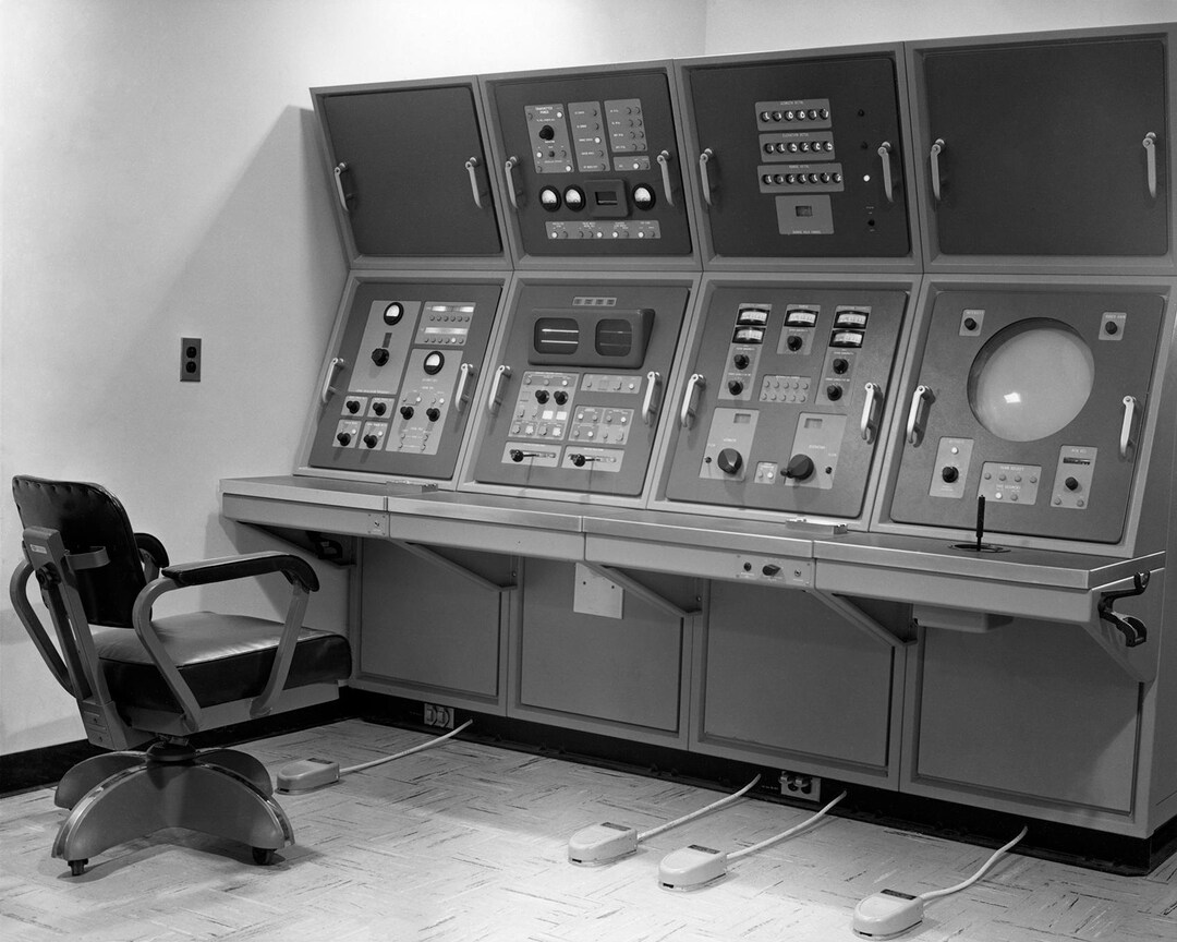 Outdated Computing - Office Chair in Front of a Massive Computer Bank ...