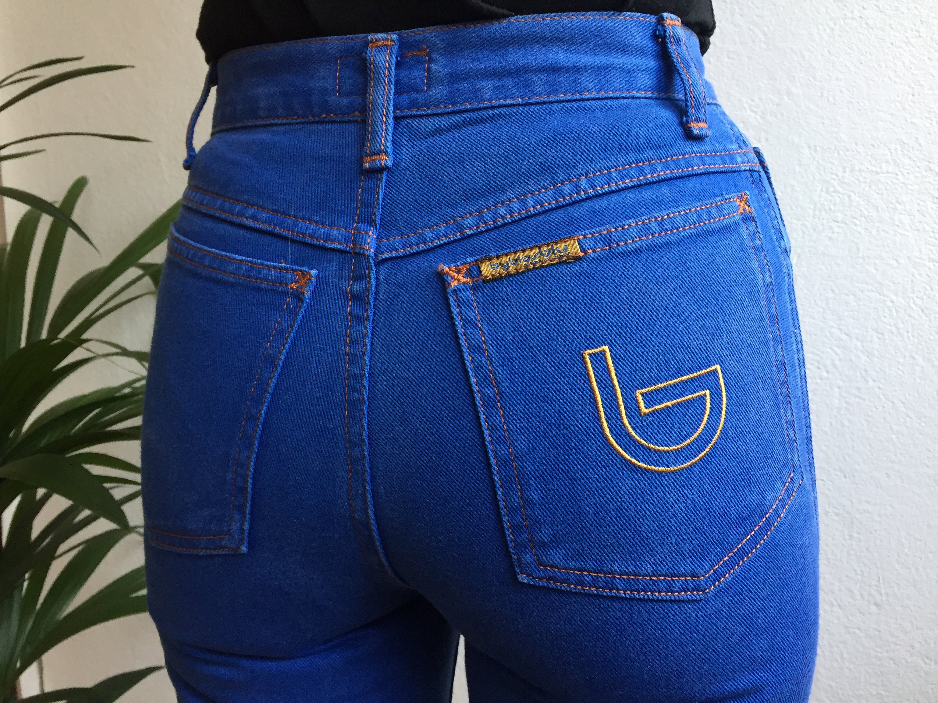 Pantaloni jeans aderenti a vita alta con gamba dritta e vestibilità ...