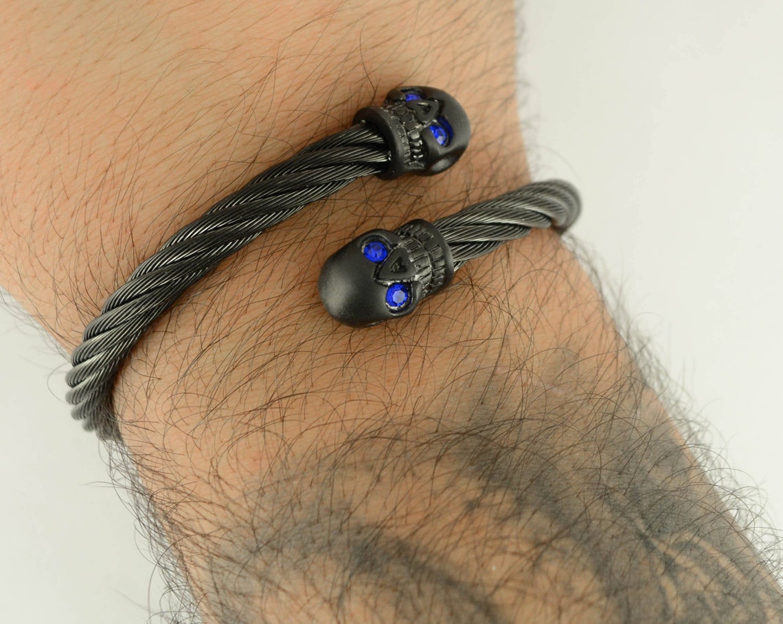 Heavy Metal Jewelry Gunmetal Wired Skull Bracelet With Sapphire ...