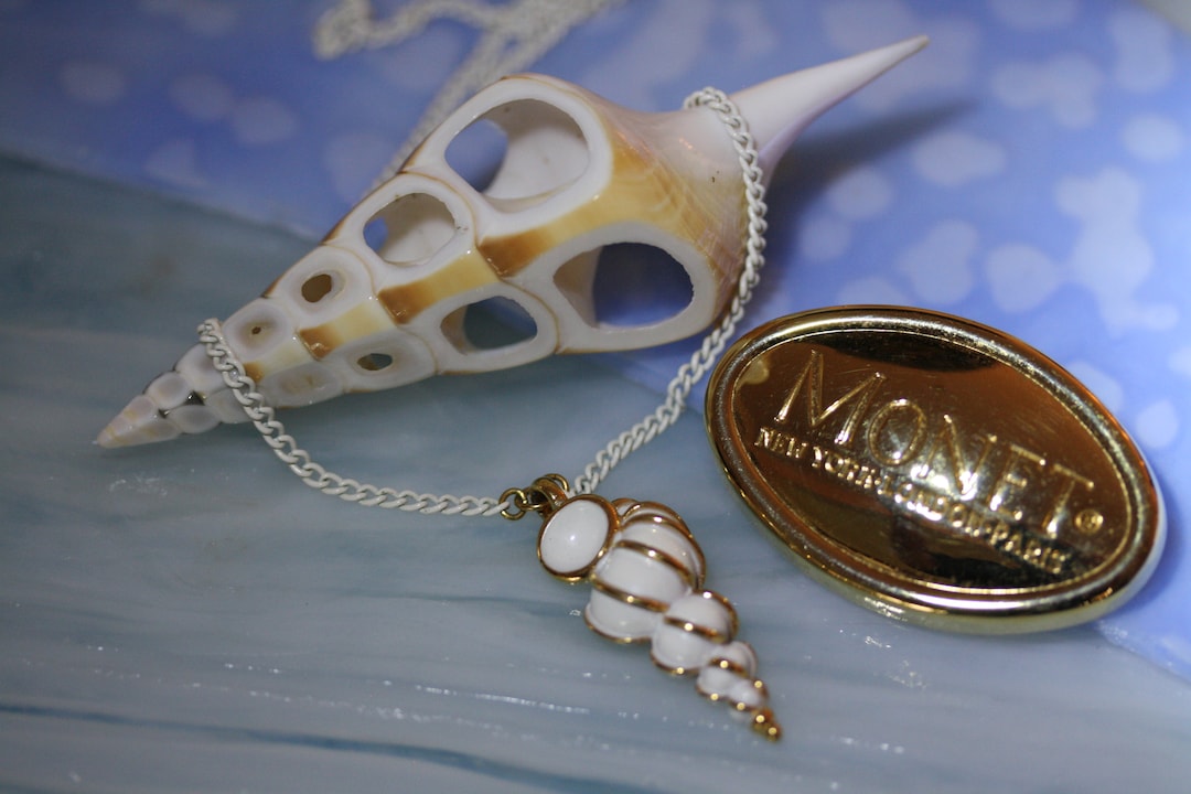 Signed Monet Sea Shell in White Enamel and Gold Wire Wrap on White ...
