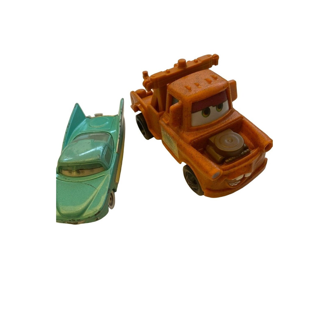 Lot of 2 Disney Cars, Flo (diecast), Mater Tow Truck (plastic) - Etsy