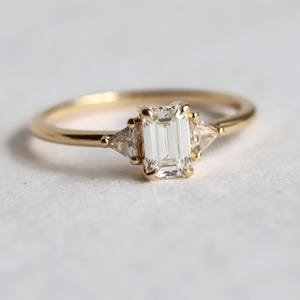 Alexis | 0.7 Ct. Emerald Cut Lab Grown Diamond Three-stone Ring ...
