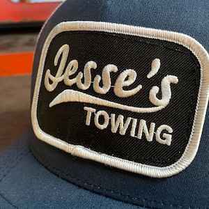 Orphan Black Jesse's Towing Hat, Black Trucker Hat With White Mesh, Mid ...