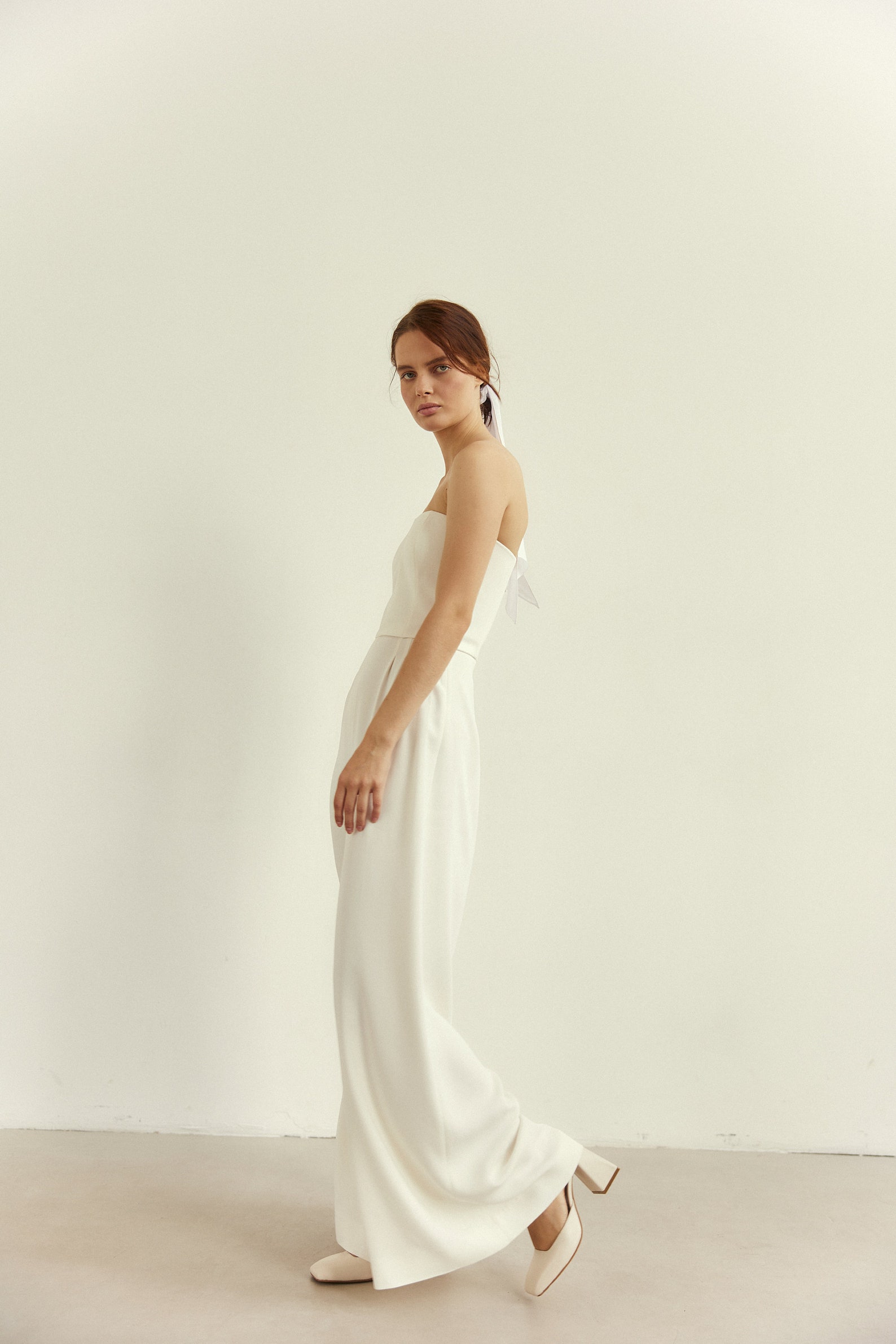 White Sleeveless Wide-leg Corset Bridal Jumpsuit With Voluminous ...