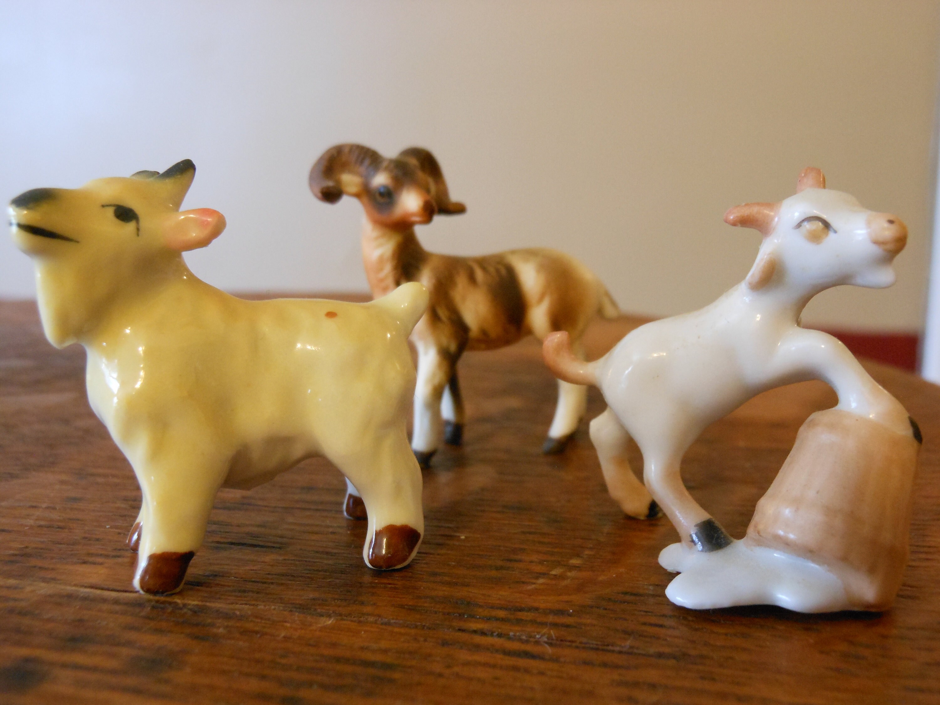 Four Bone China Miniature Mountain Goats & a Ram